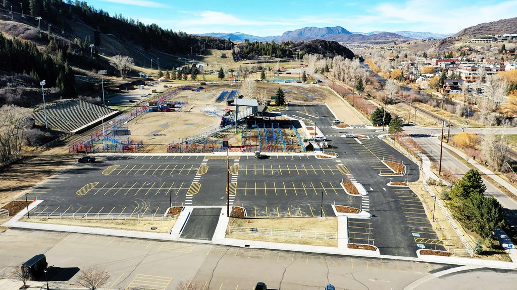 PHOTOS: City adds 210 paved parking spaces, EV charging stations to ...